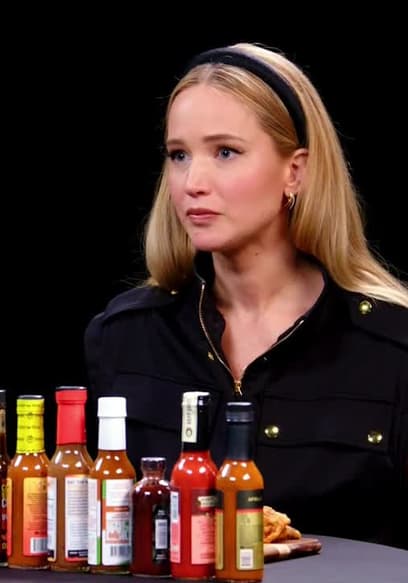 Watch Hot Ones S21:E05 - Jennifer Lawrence Sobs in Pain While Eating ...